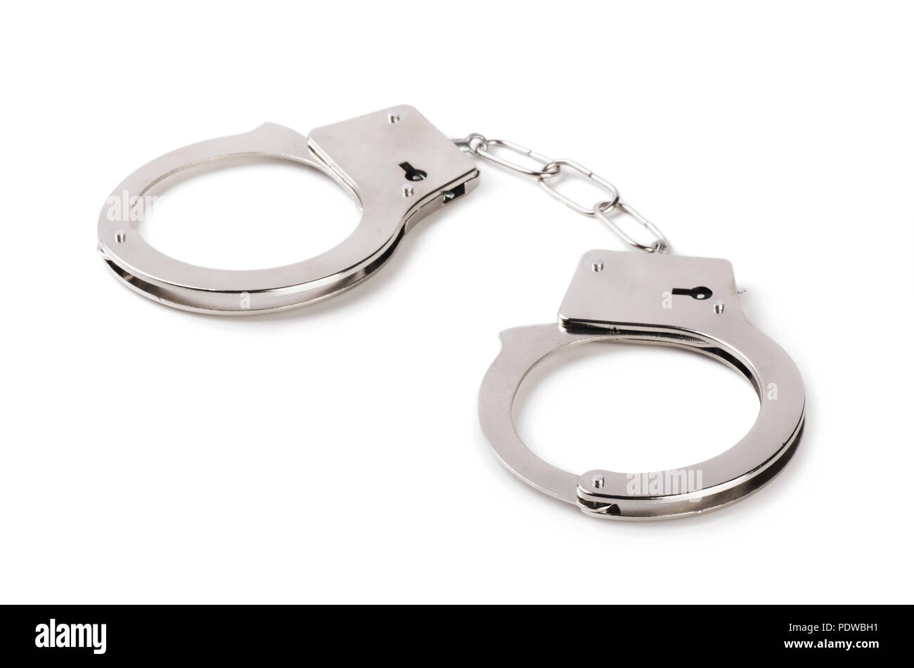 Old handcuffs isolated on white background Stock Photo - Alamy