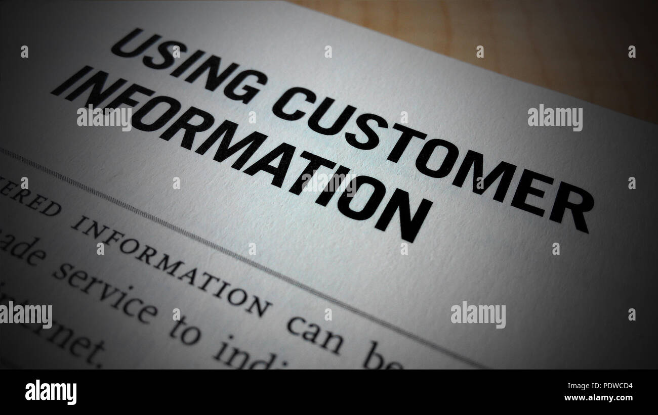 Using customer information word printed on white paper Stock Photo - Alamy