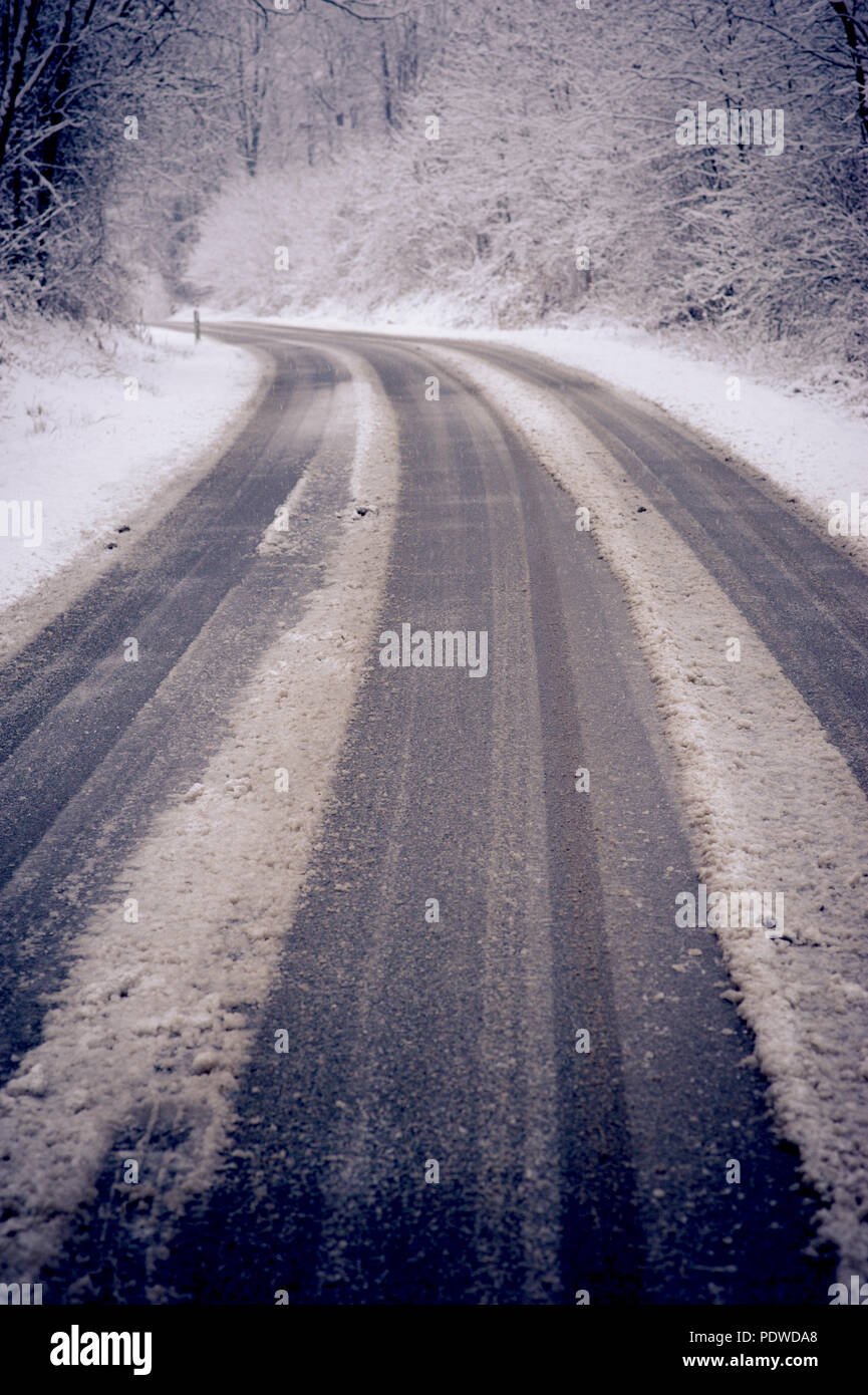 winter road with snow on the ground. travel in difficult way to enjoy ...