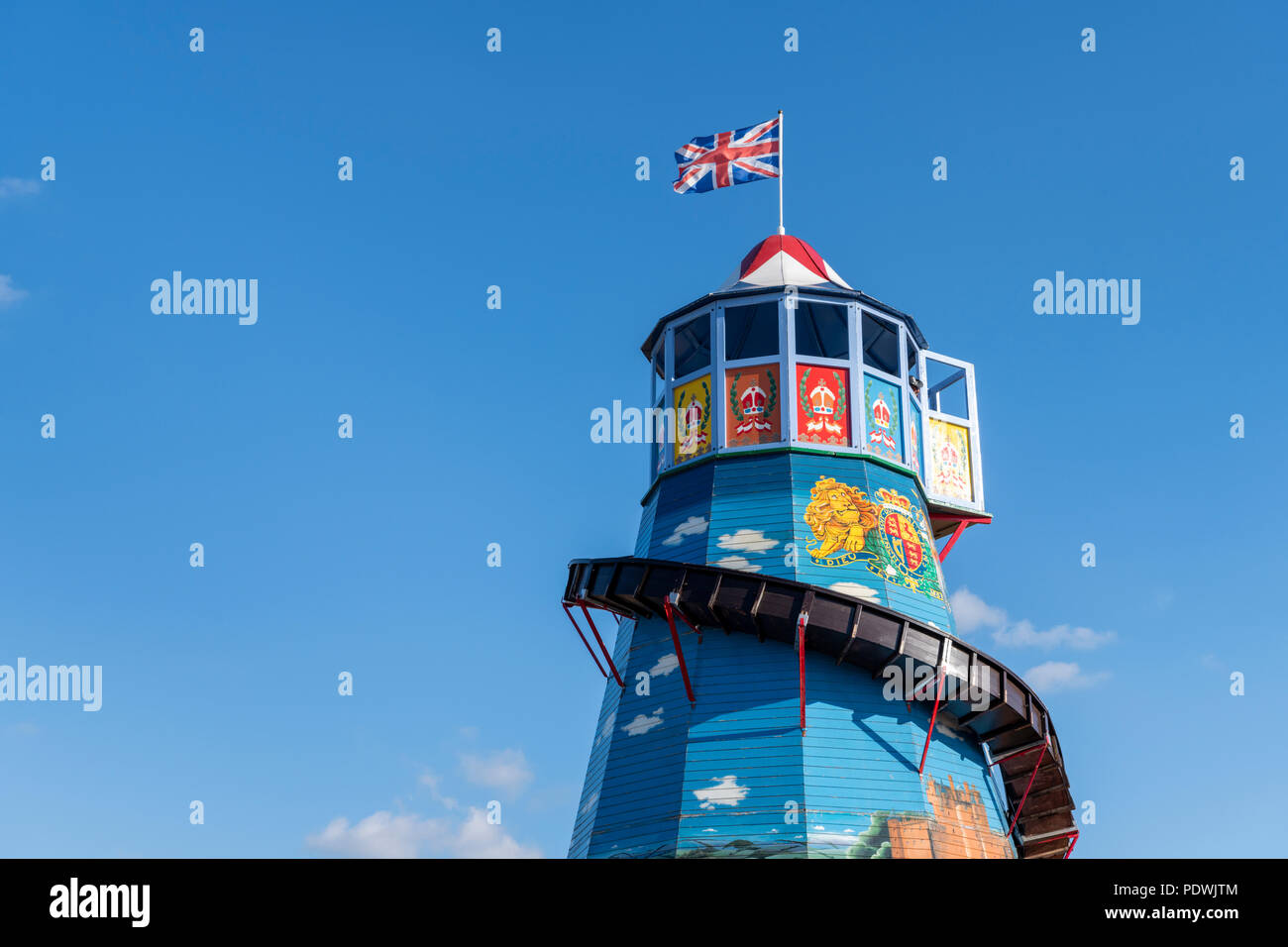 A helter skelter slide at a fairground or funfair in the UK Stock Photo ...