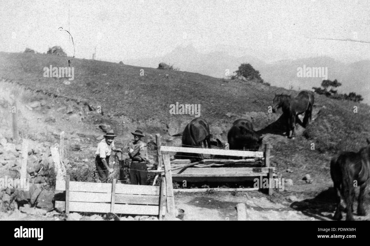 Water trough on a farm Black and White Stock Photos & Images - Alamy