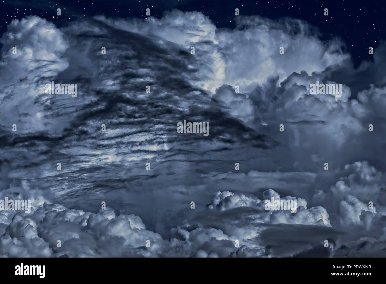 Details of a strong cloud in a starry night Stock Photo - Alamy