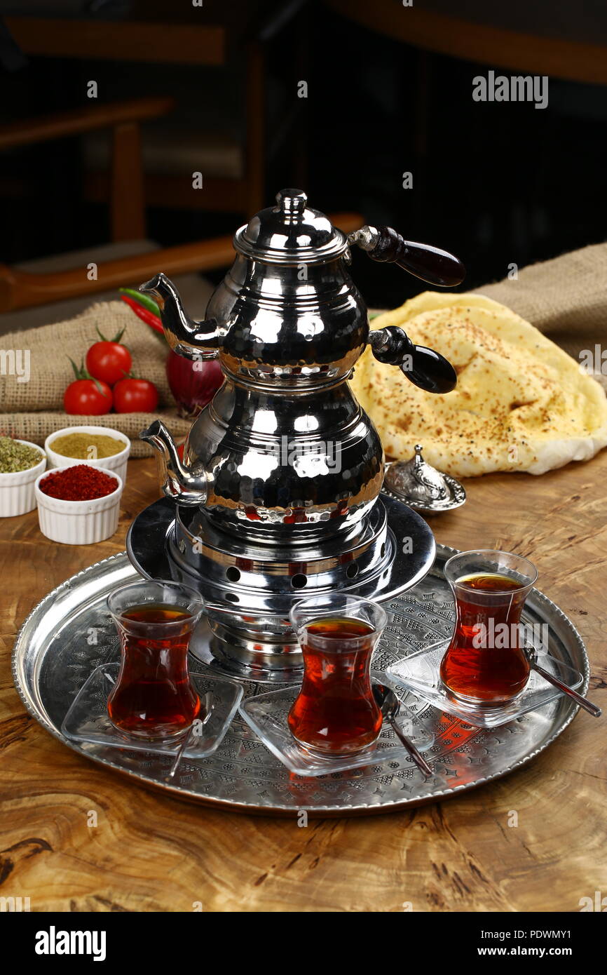 Turkish tea pot with glass of tea Stock Photo - Alamy