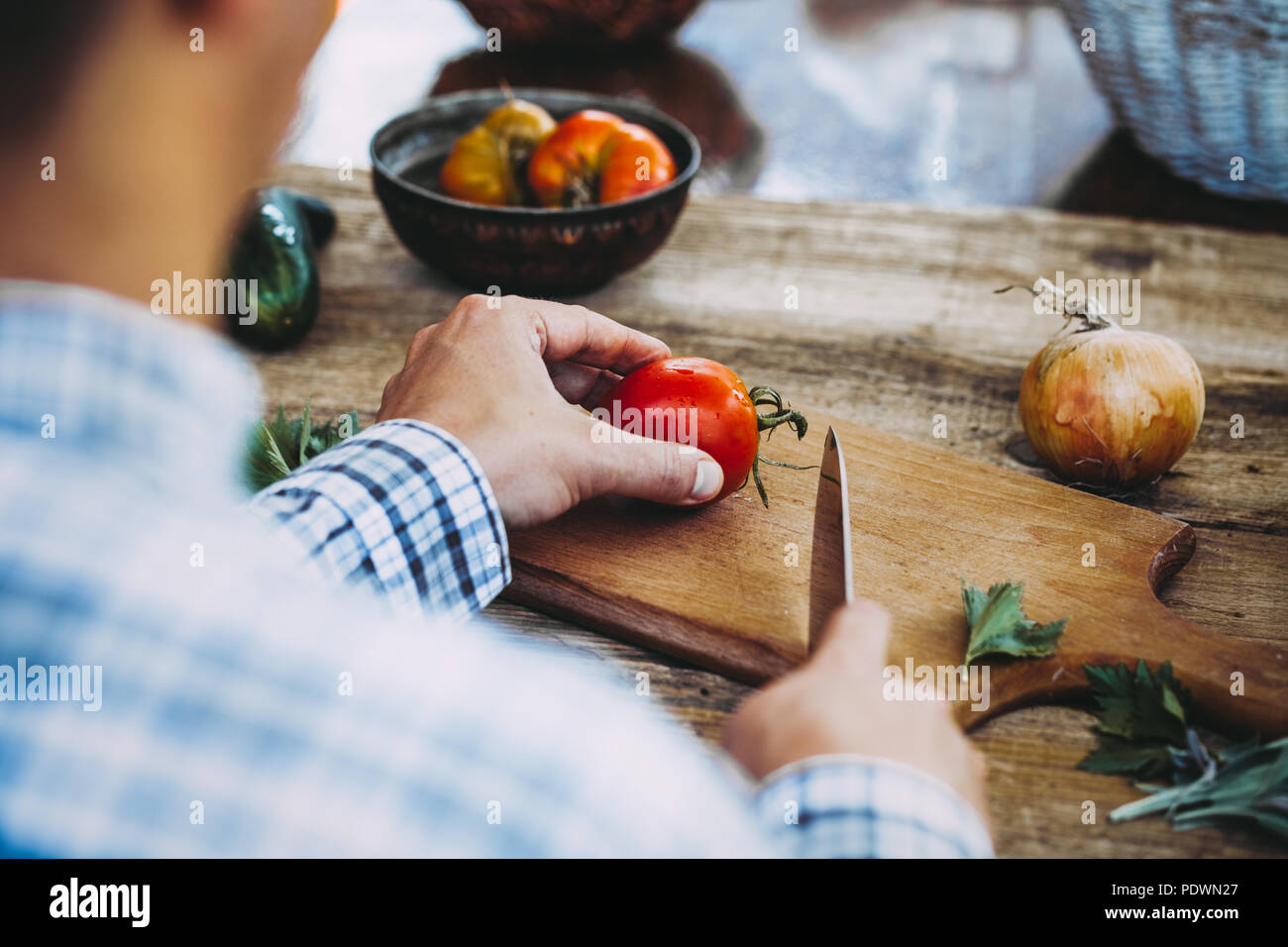 Healthy food. Chef is preparing vegetables salad. Fresh homemade food ...