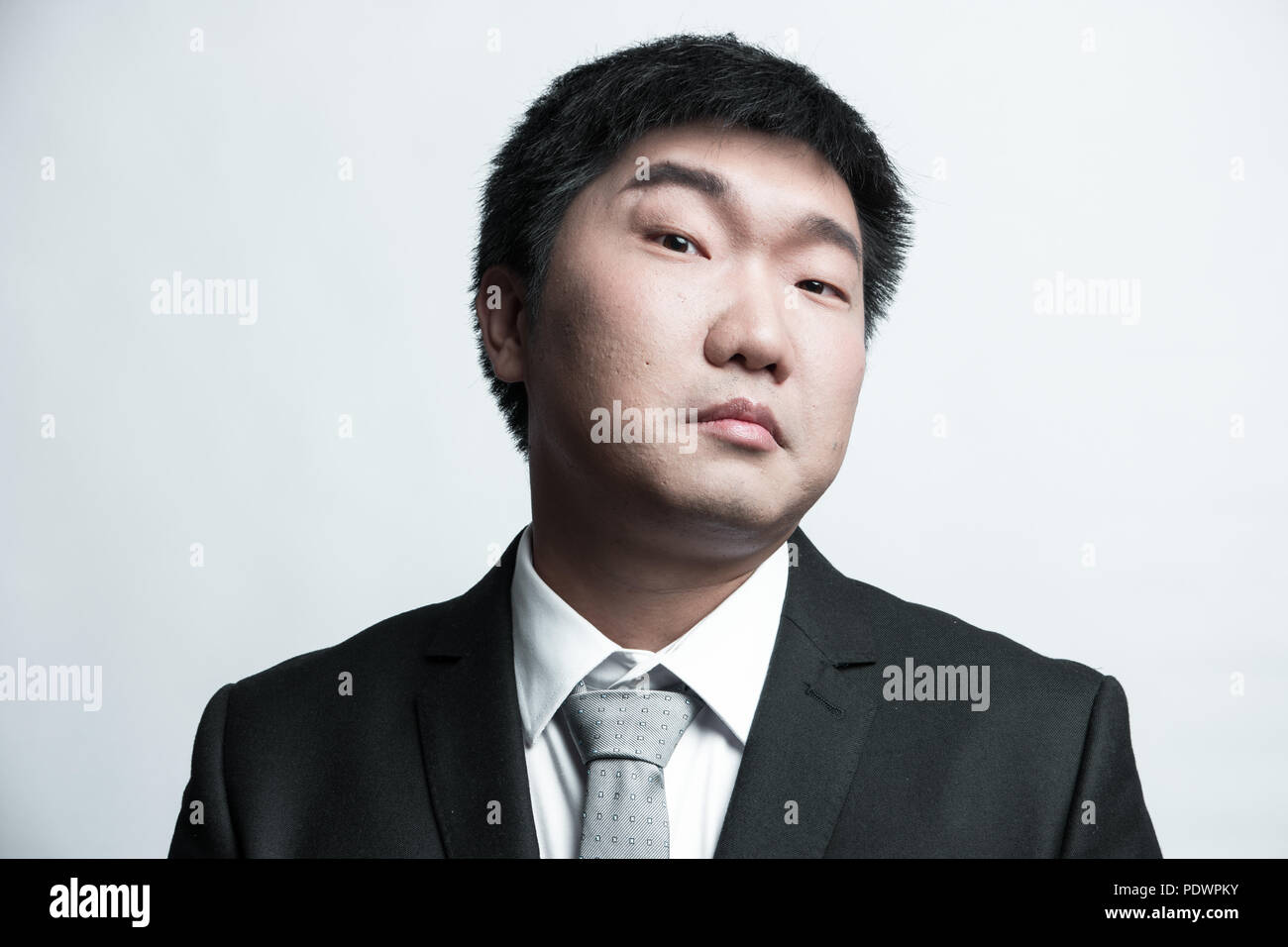 Posing spectacles suit tie hi-res stock photography and images - Alamy