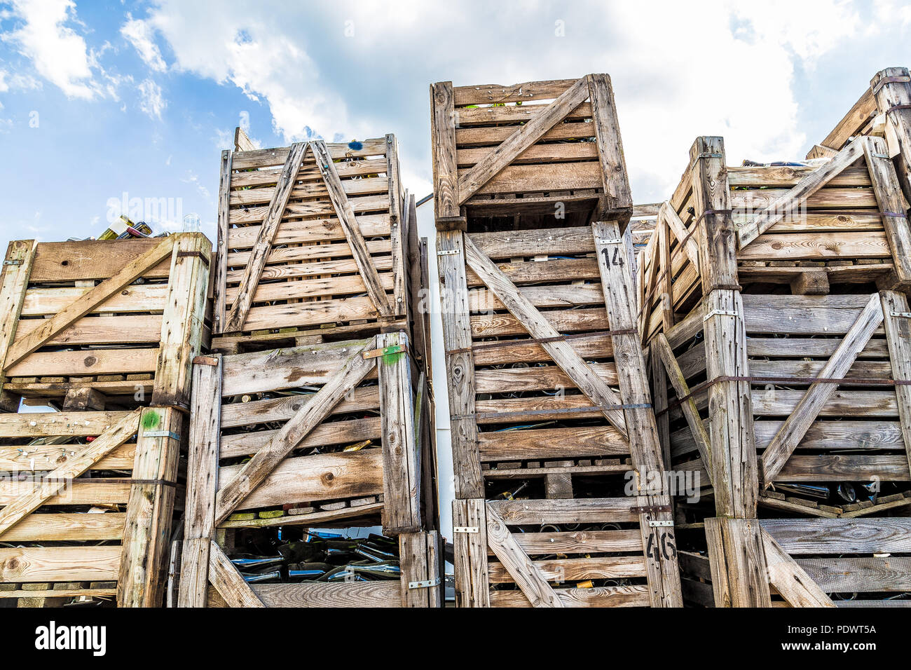 Empty wine bottles stacked in wine boxes Stock Photo - Alamy