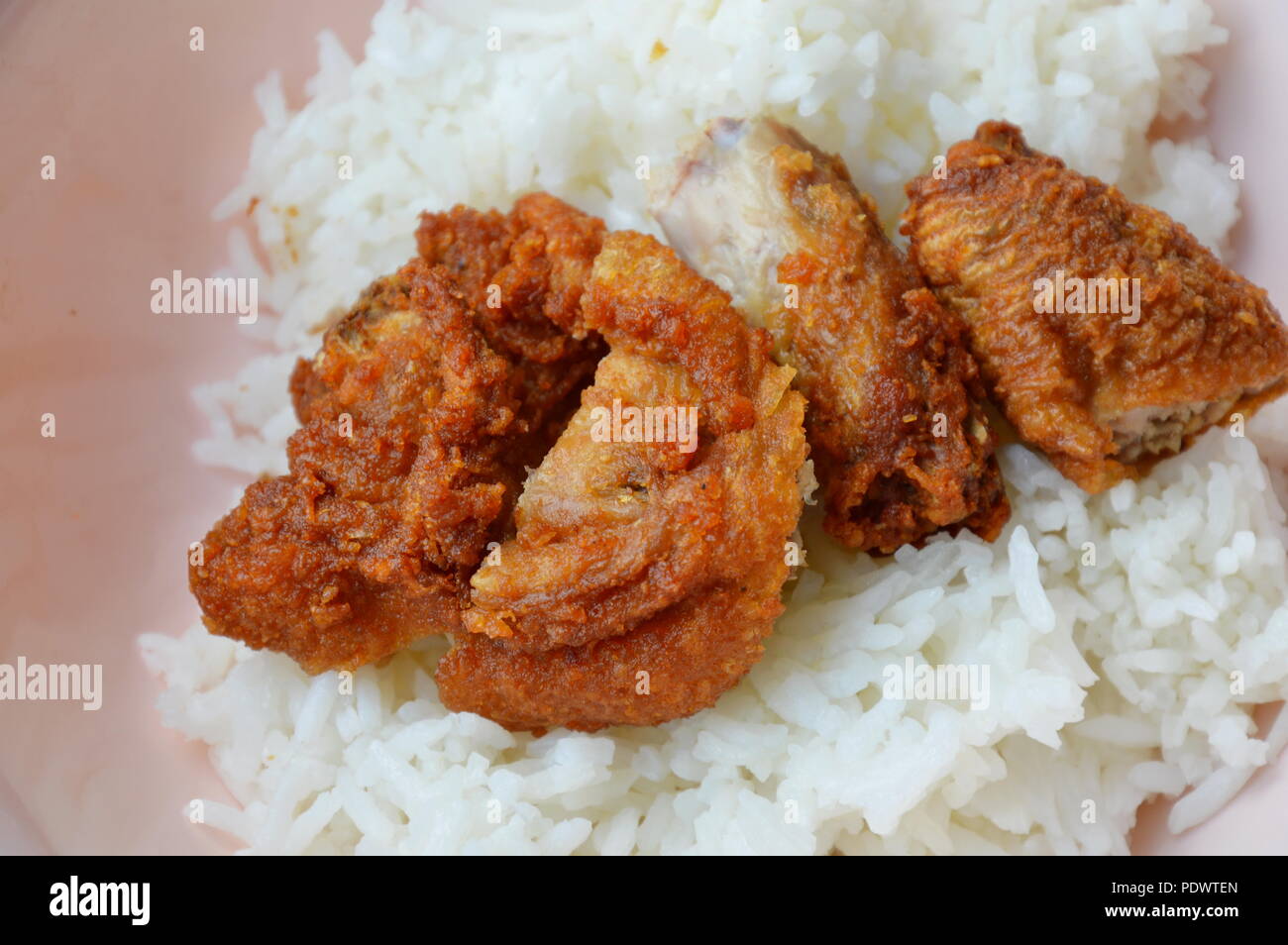 fried chicken on plain rice Thai fast meal Stock Photo - Alamy