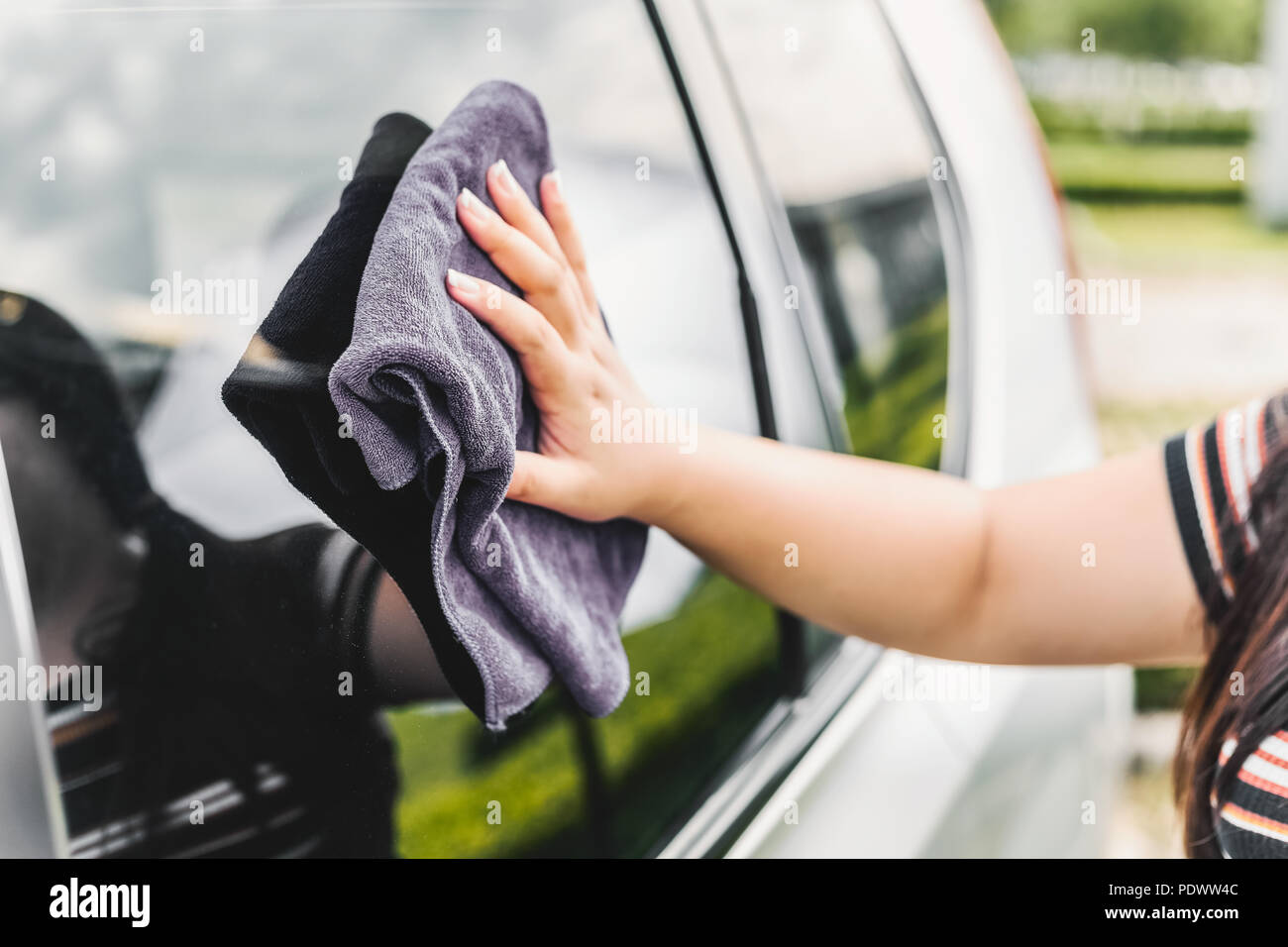 Wiping car windows hi-res stock photography and images - Alamy