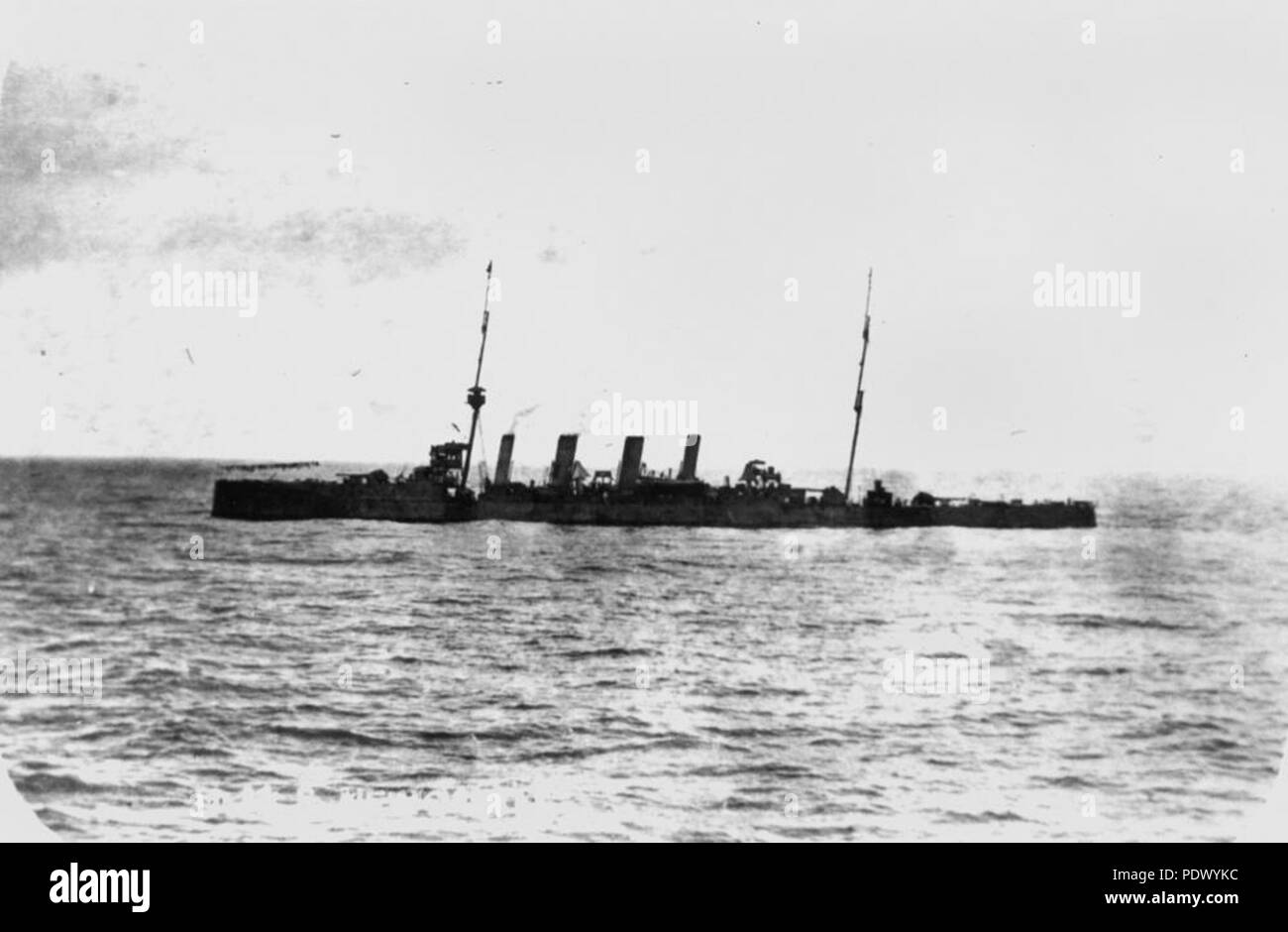 230 StateLibQld 1 149027 Battleship HMS Newcastle attached to a ...