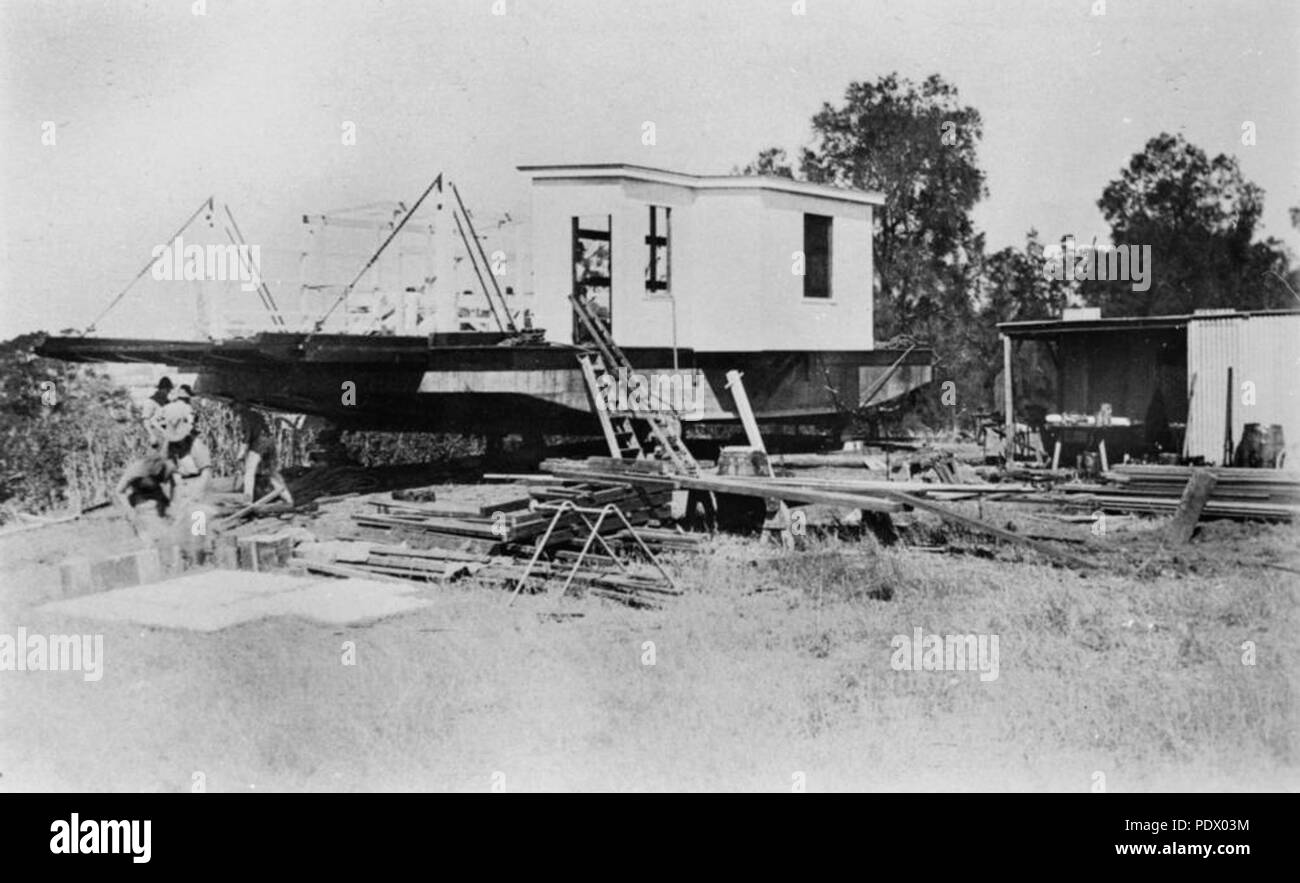 232 StateLibQld 1 150655 Erection of the engine house of the ...