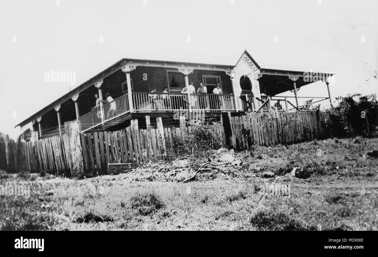 232 StateLibQld 1 152083 Doherty family on the verandah of Lilyvale ...