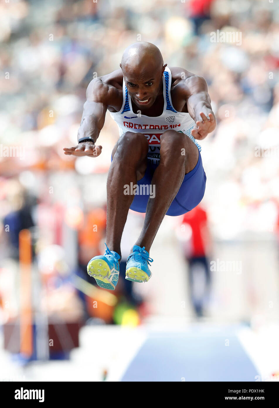 Nathan douglas competes in the triple jump qualifying round hi-res ...