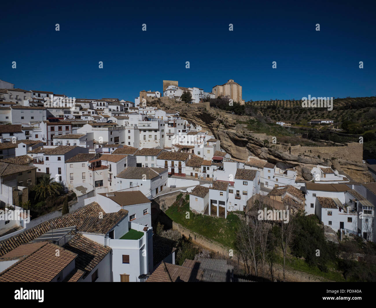 Skyline of white village of Setenil de las Bodegas, Spain Stock Photo ...