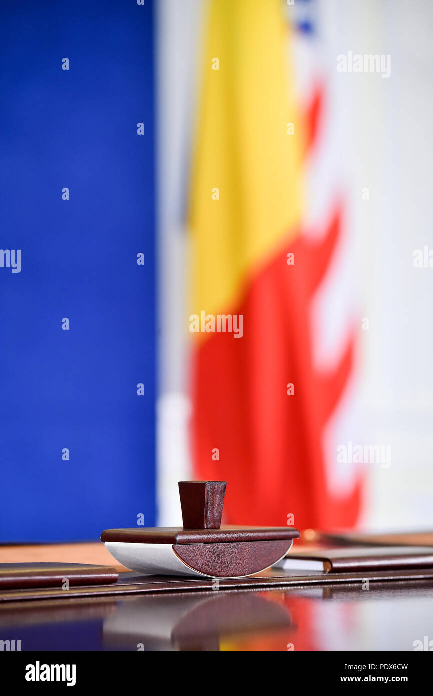 Concept shot with a stamp and flags in the background after treaty sign ...