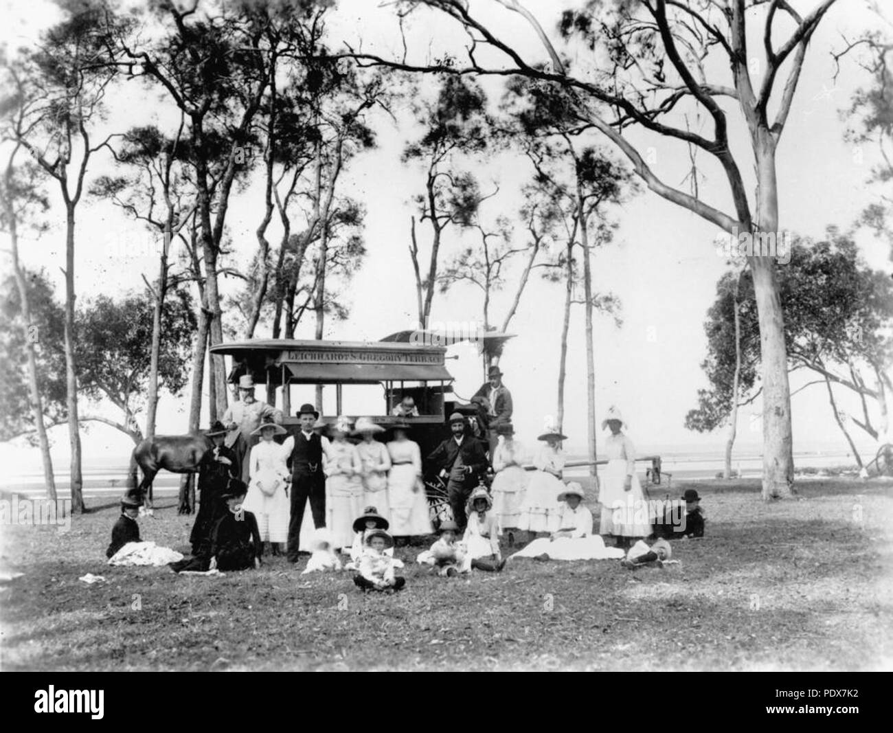 267 StateLibQld 1 46087 Family group at a Lota picnic ground, Brisbane ...