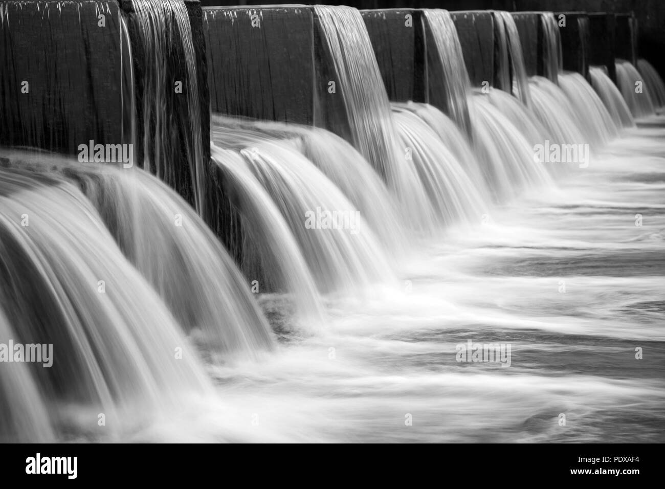 Water cascades from Aire & Calder Navigation into an overflow of ...
