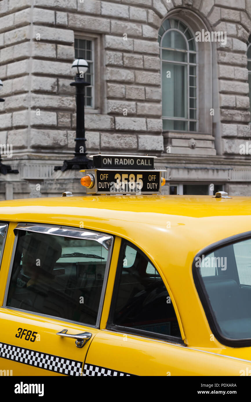 Vintage Washington DC yellow taxi cab photographed in Liverpool UK ...