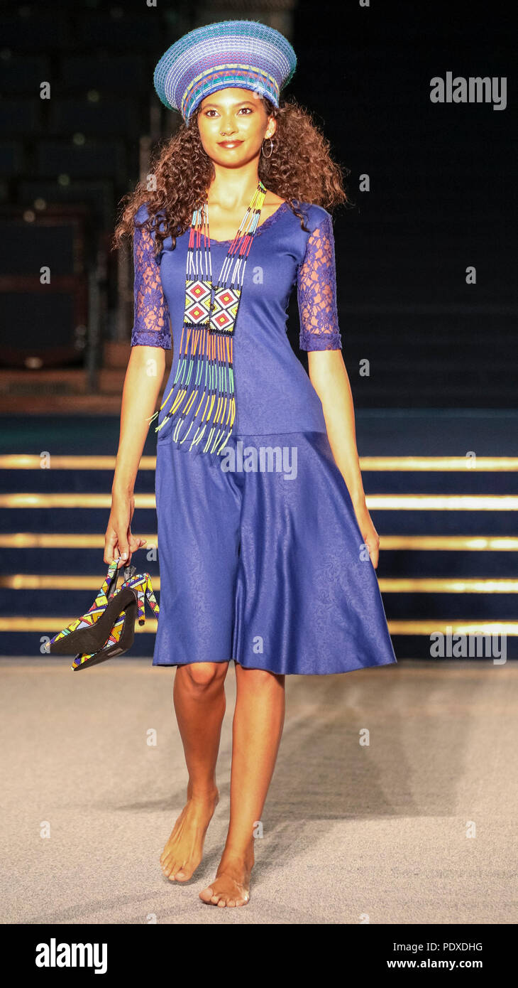London, UK, 10th Aug 2018. A model wears a 'Gugu' design from the TIKZN ...