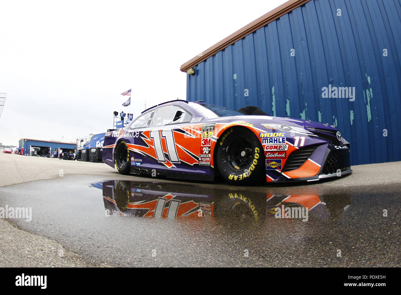 Brooklyn, Michigan, USA. 10th Aug, 2018. Denny Hamlin (11) takes to the ...