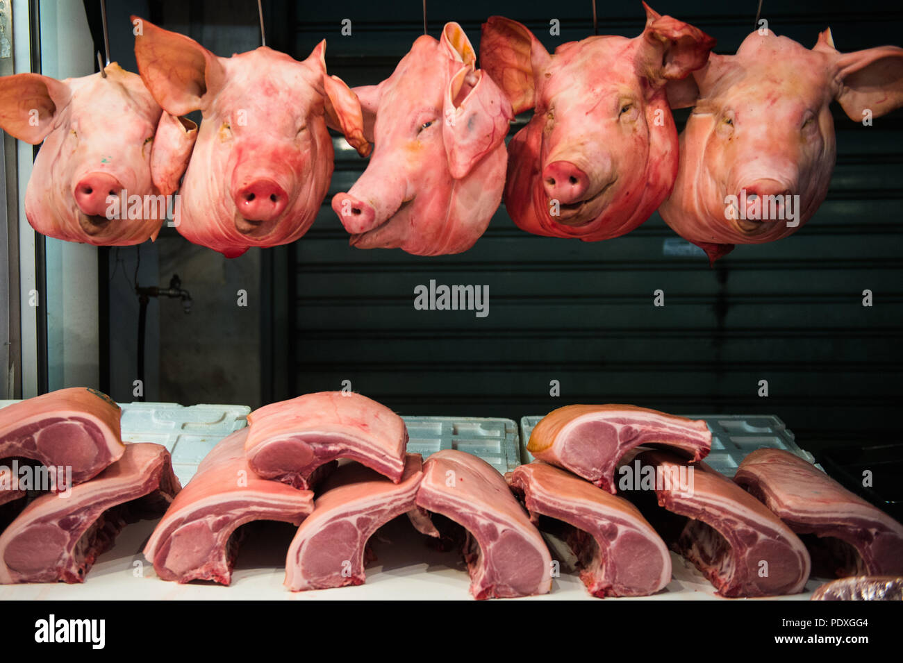 Athens, Greece. 10th Aug, 2018. Pigs heads are seen at Agora Market ...