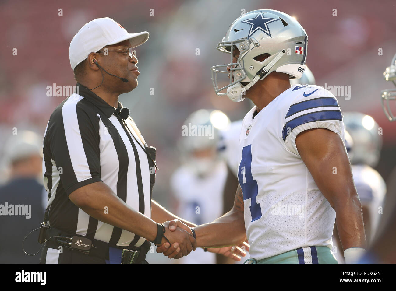 August 8, 2018: referee Ron Torbert (62) shakes hands with Dallas ...