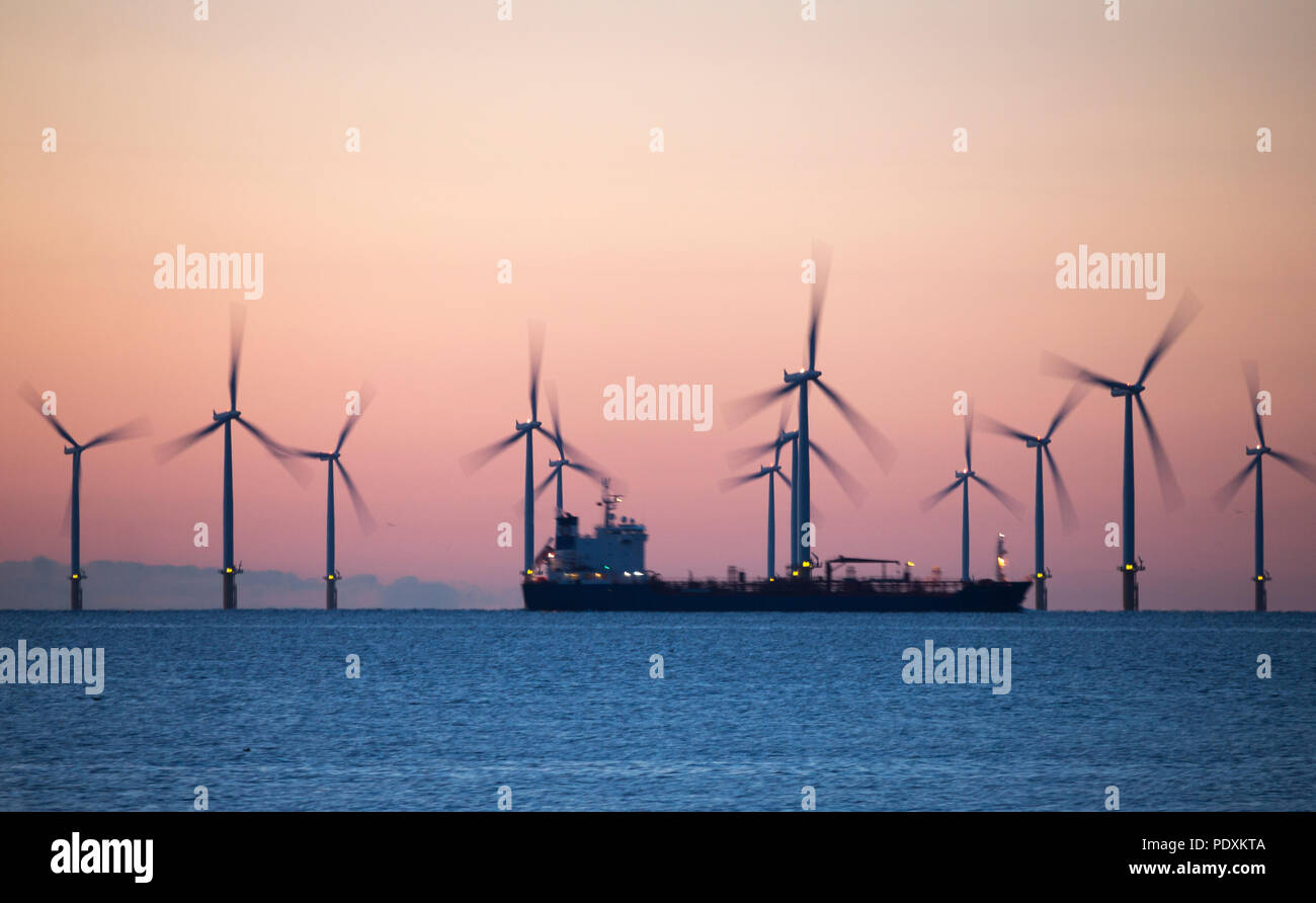 Ship passing Teesside Offshore Wind farm on the north east coast of ...