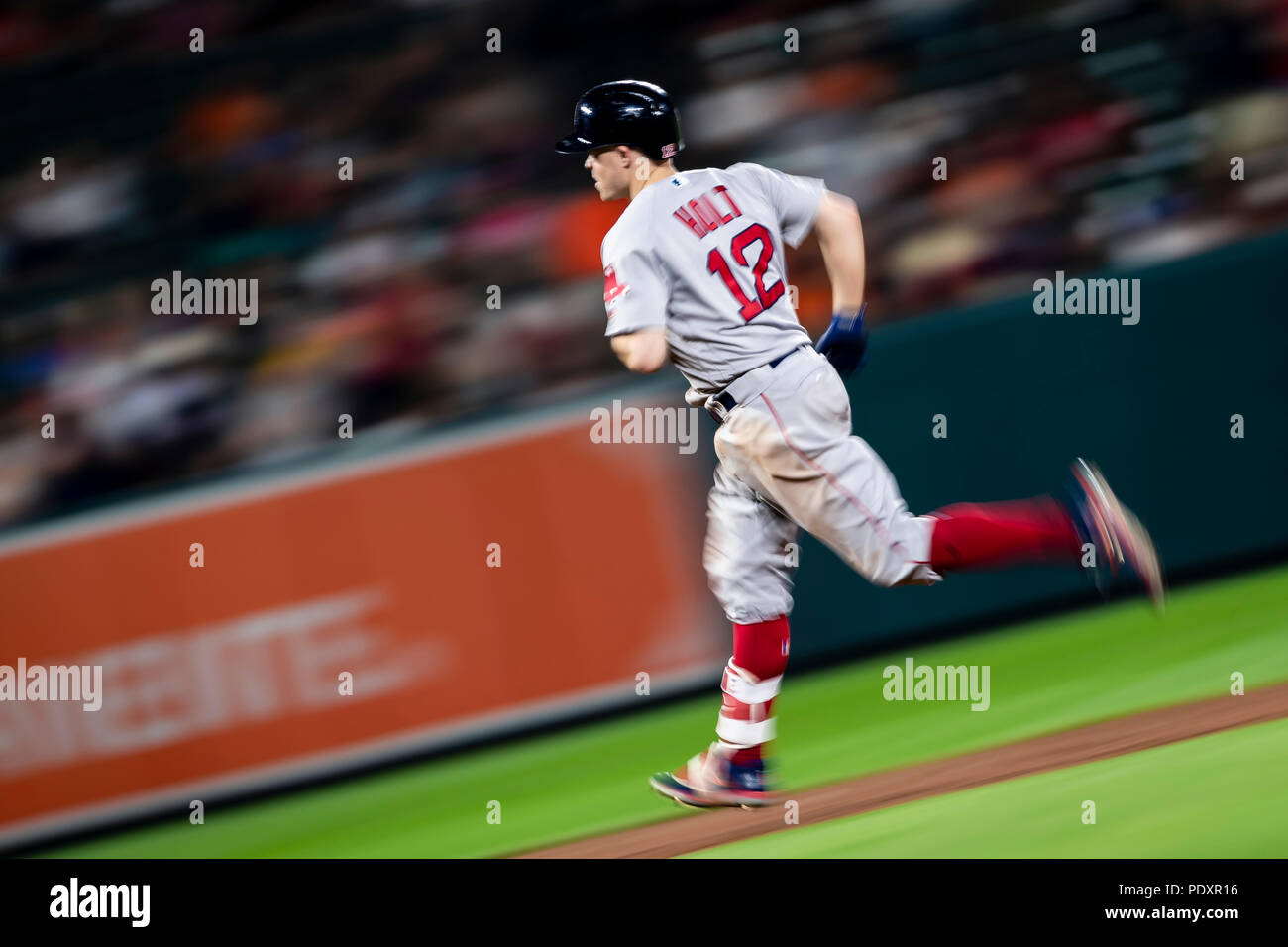 August 10, 2018: Boston Red Sox second baseman Brock Holt (12) hits a ...