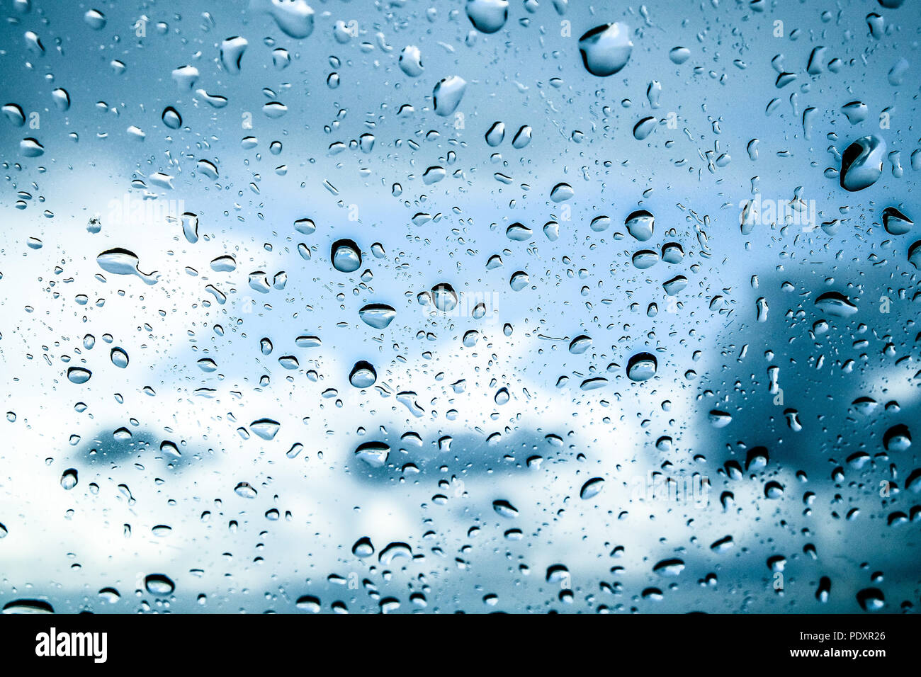 Raindrops on windshield storm clouds hi-res stock photography and ...