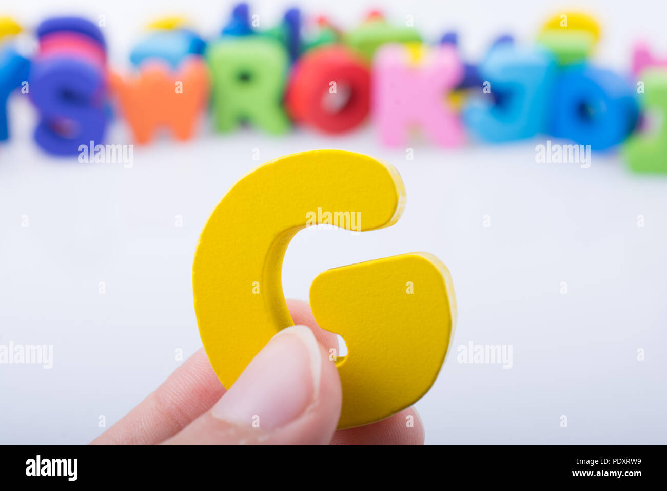 Letter cube of G of Alphabet made of wood Stock Photo - Alamy