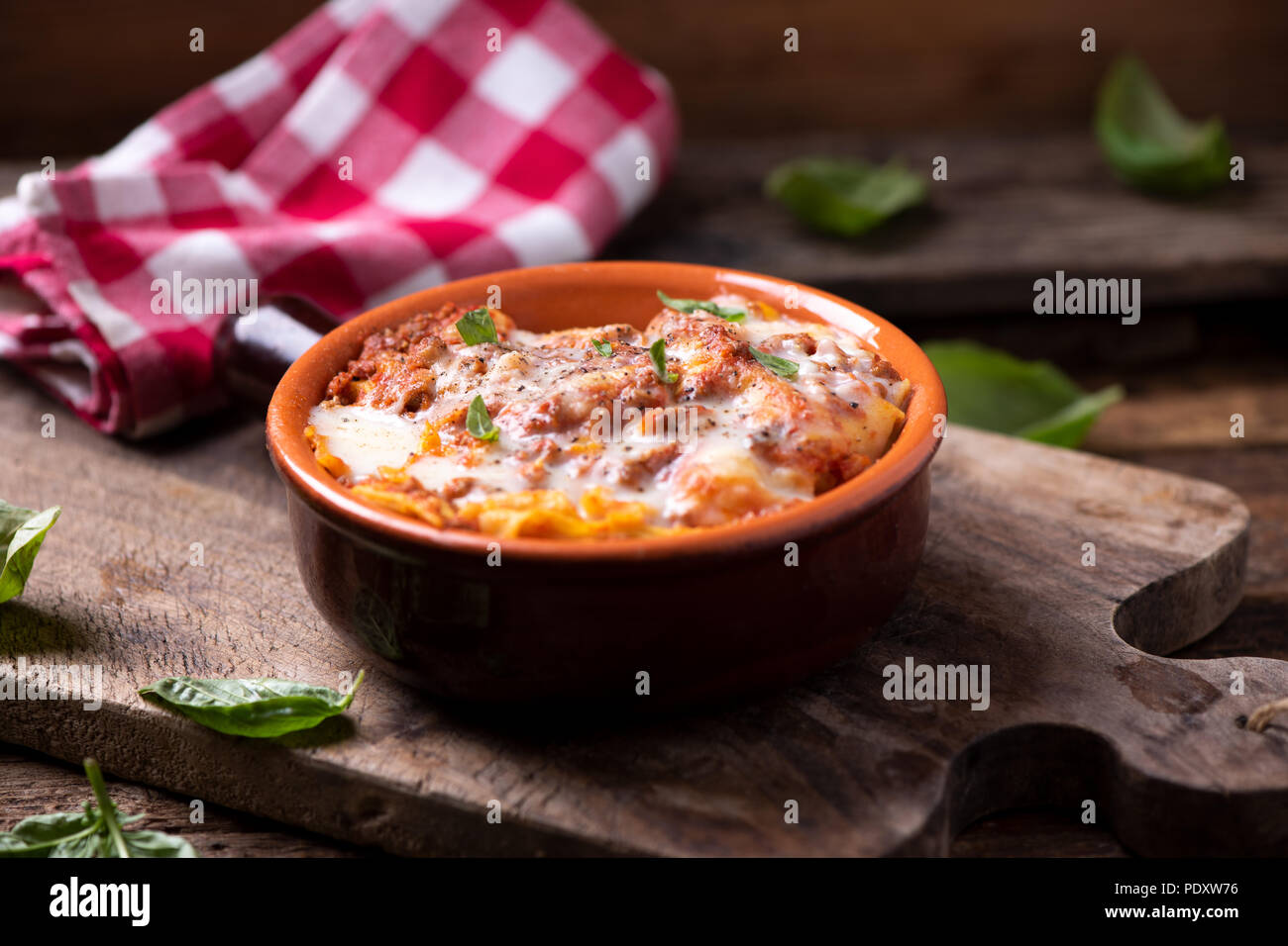 Rustic composition of an homemade lasagna Stock Photo - Alamy