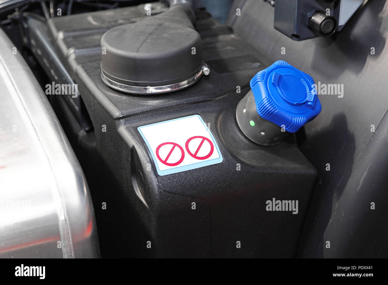 Diesel exhaust fluid additive for trucks Stock Photo - Alamy