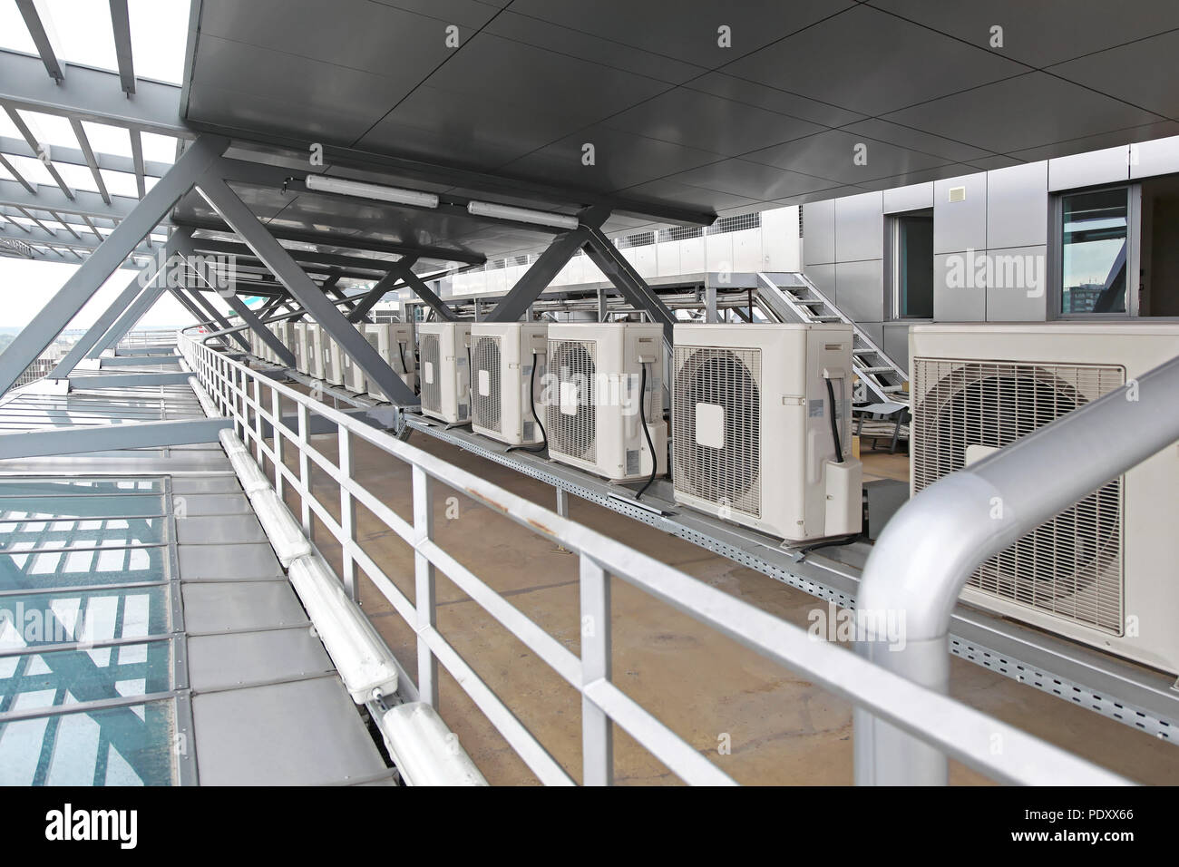 Air conditioners condenser units at building rooftop Stock Photo - Alamy