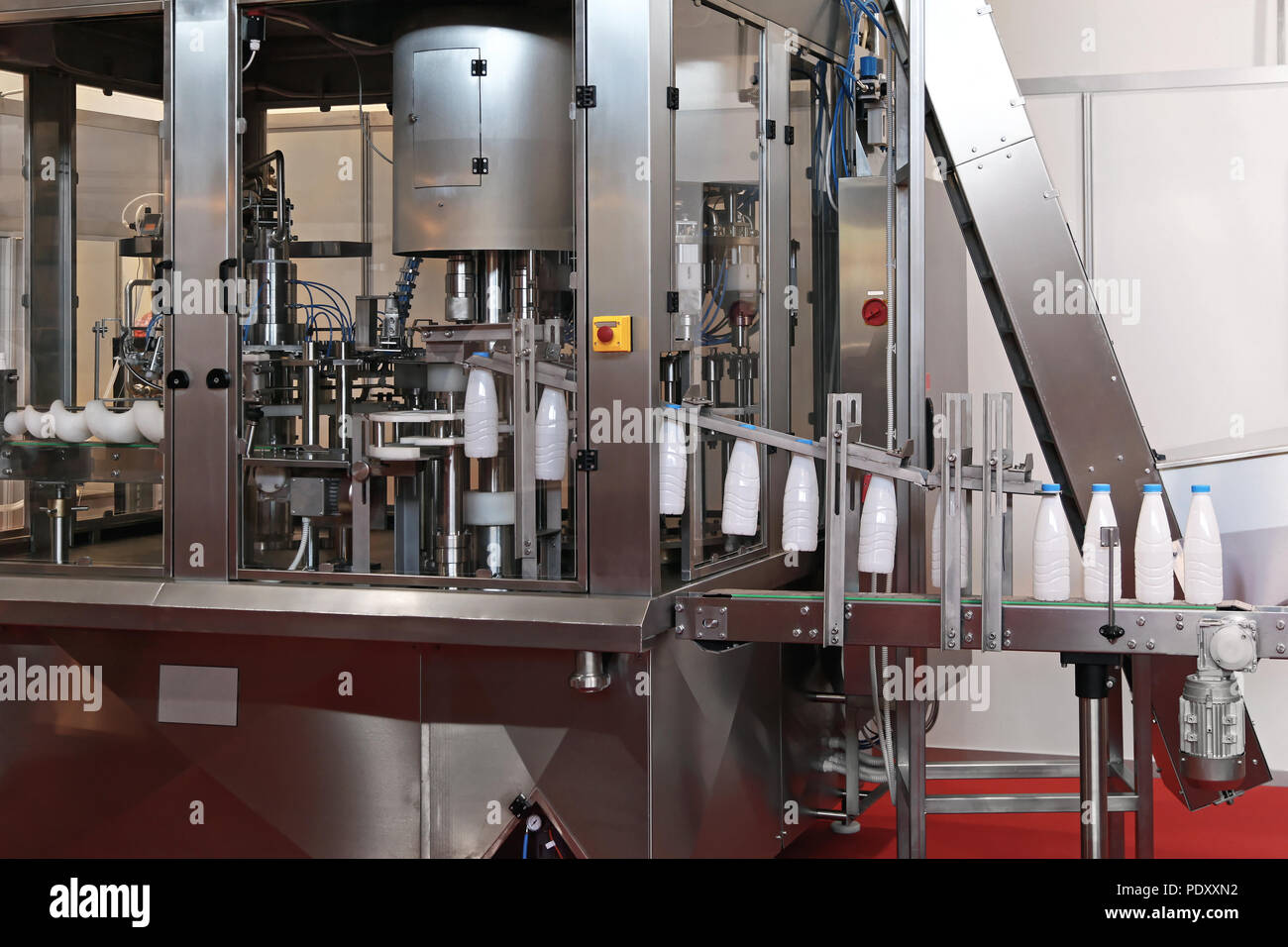 Milk bottle filling machine hi-res stock photography and images - Alamy