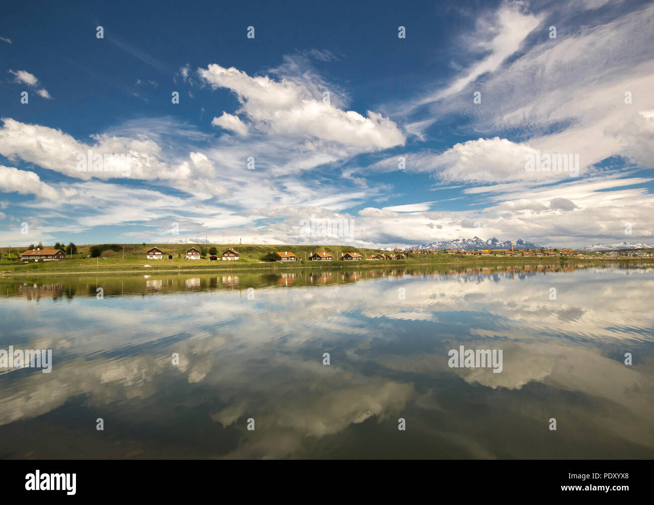 Ushuaia dock, a slim strip of land between sea and sky Stock Photo - Alamy