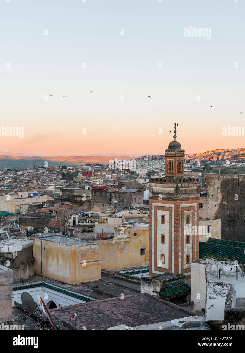 View of the old town, mosque with minaret, sunset, Fes-Boulemane, Fez ...