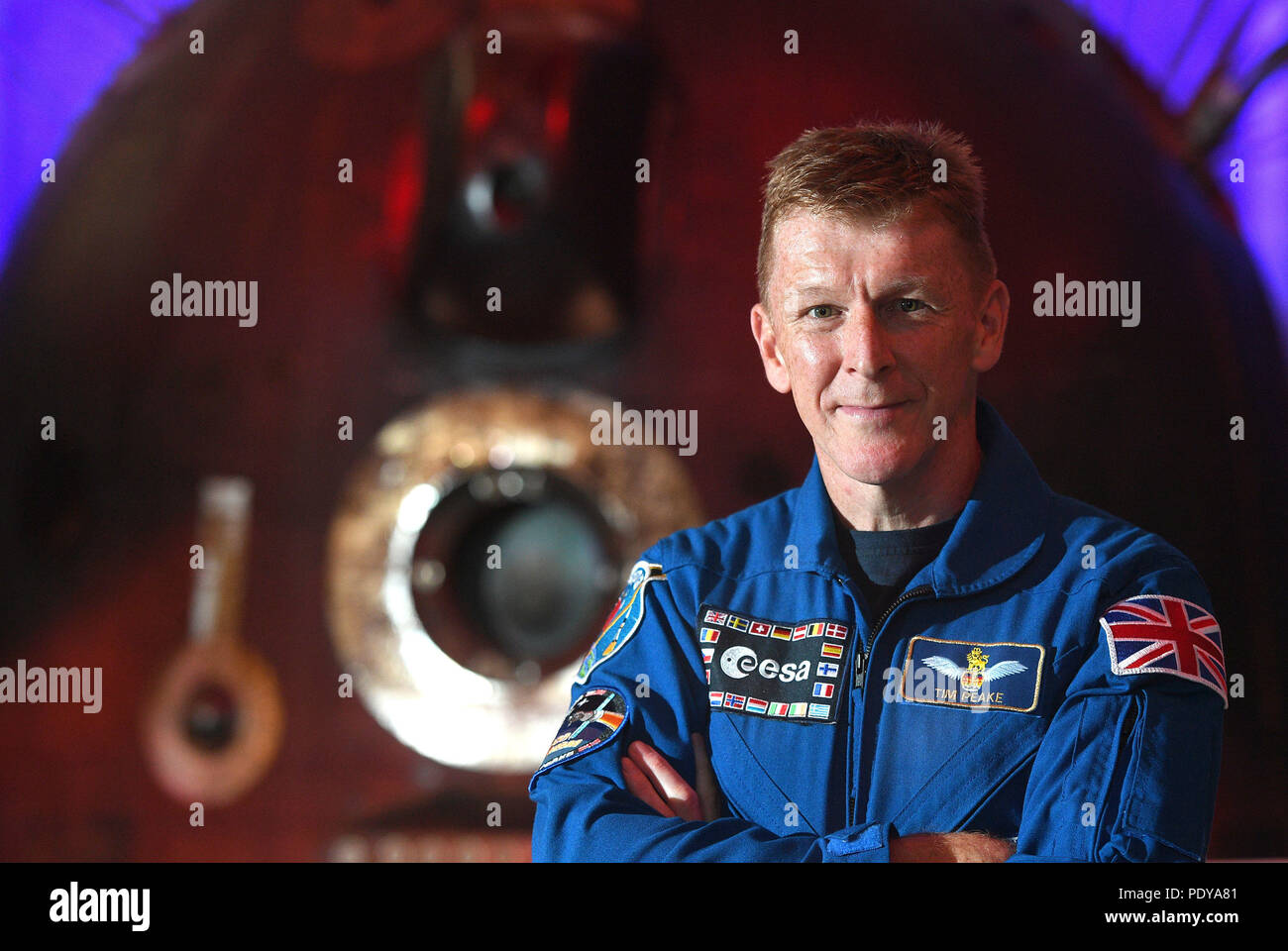 Major Tim Peake with the Soyuz descent module, the spacecraft which ...