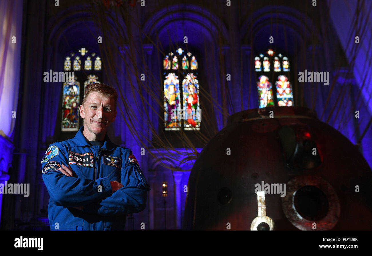 Major Tim Peake with the Soyuz descent module, the spacecraft which ...