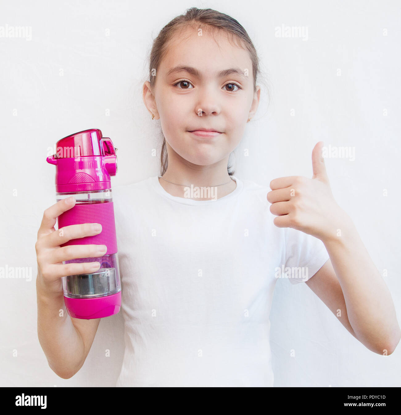 cute girl with red bottle of water, healthy lifestyle, drinking plenty ...