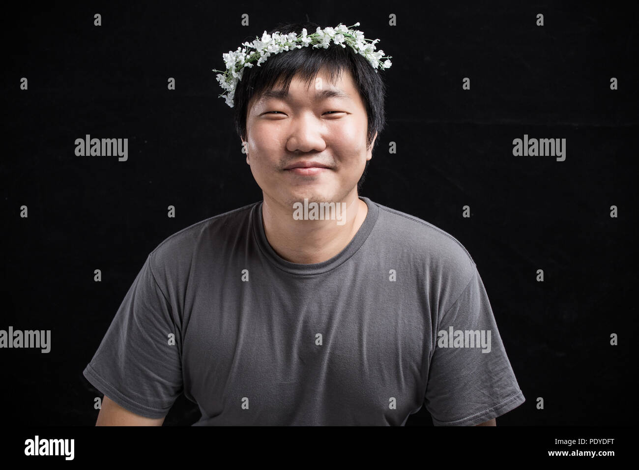 Portrait young man wearing garland hi-res stock photography and images ...