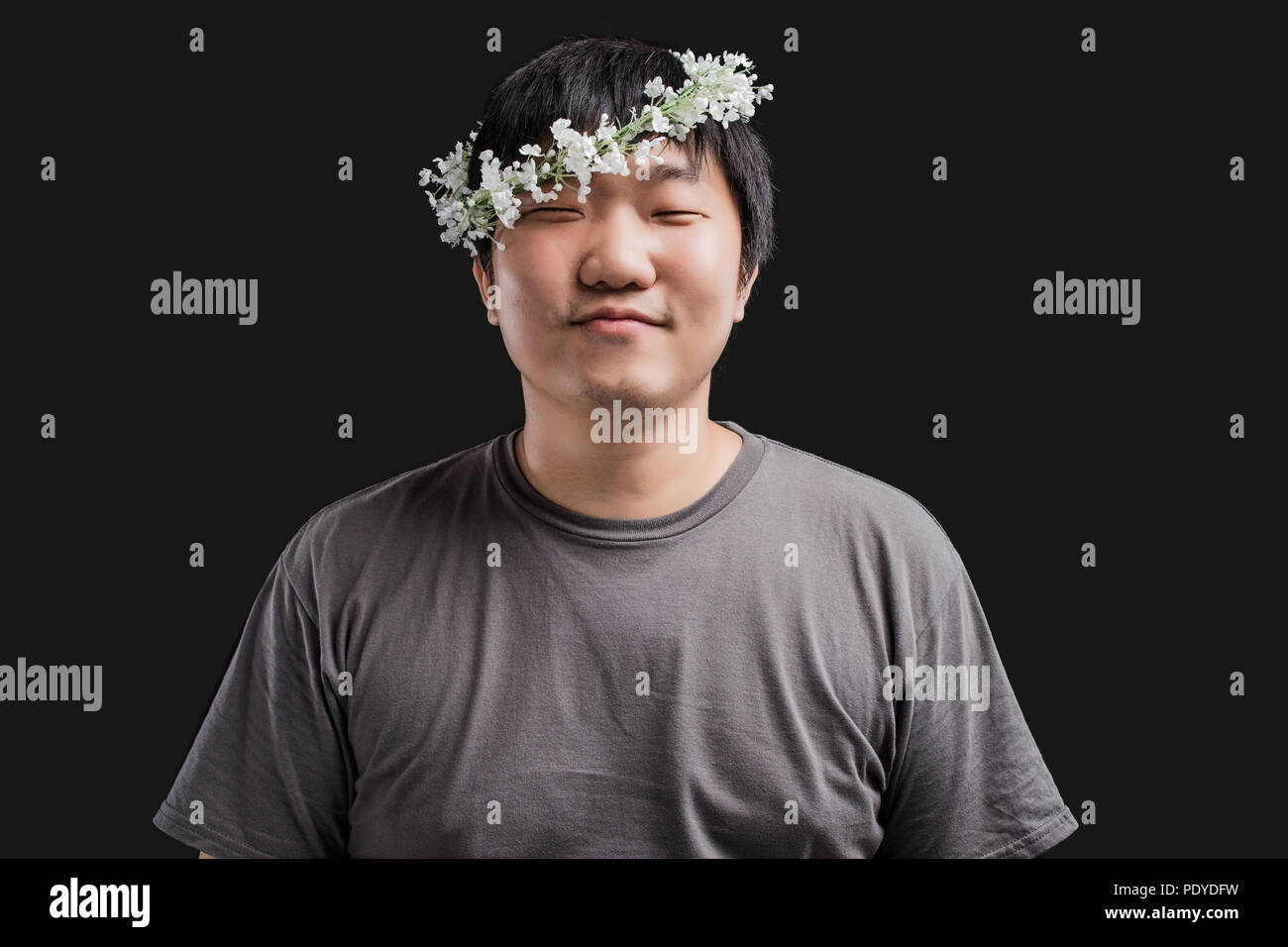 Portrait young man wearing garland hi-res stock photography and images ...