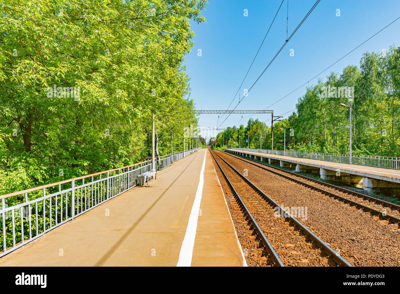 Passenger platforms of the small railway station Stock Photo - Alamy