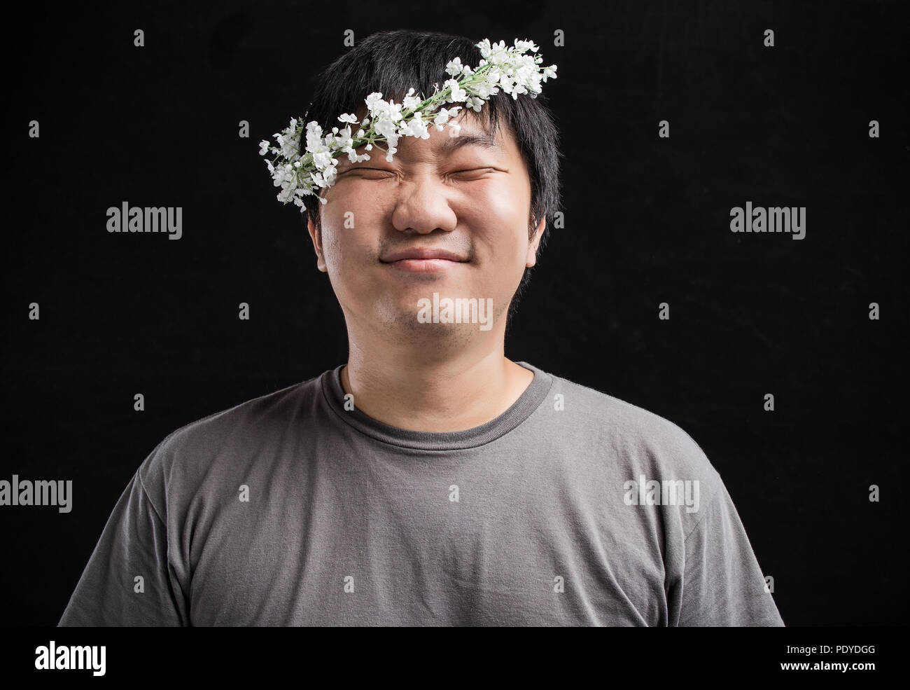 Portrait young man wearing garland hi-res stock photography and images ...