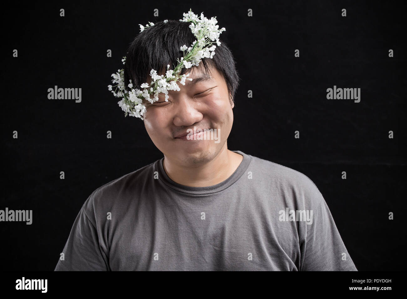 Portrait young man wearing garland hi-res stock photography and images ...