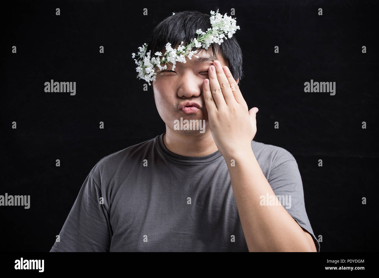Portrait young man wearing garland hi-res stock photography and images ...