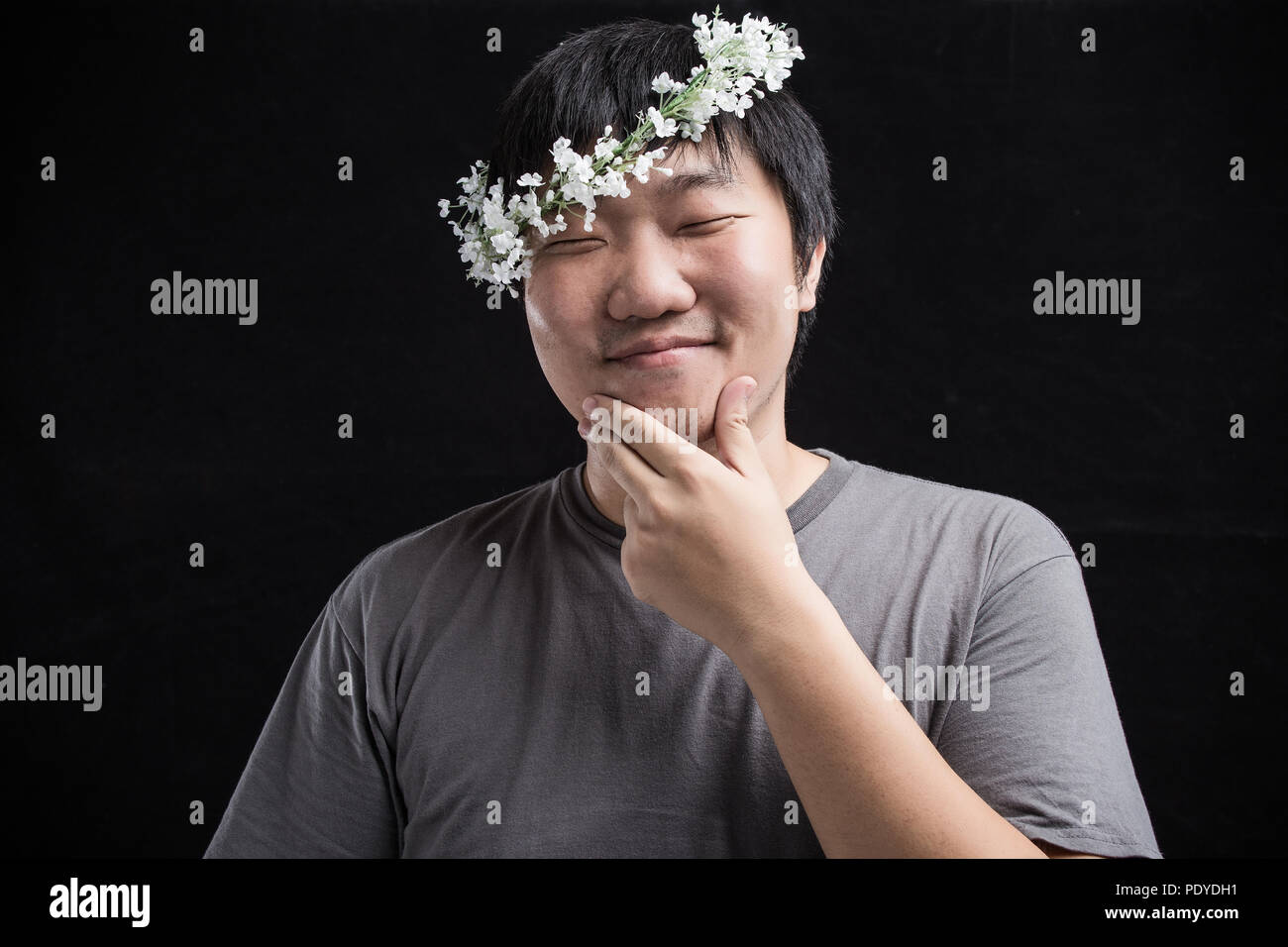 Portrait young man wearing garland hi-res stock photography and images ...