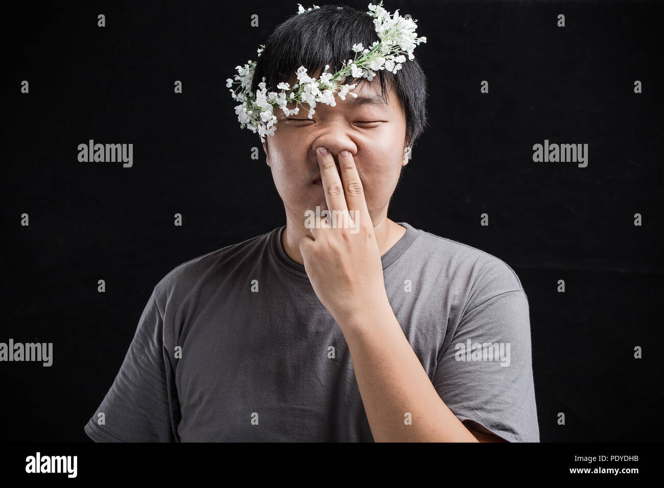 Portrait young man wearing garland hi-res stock photography and images ...
