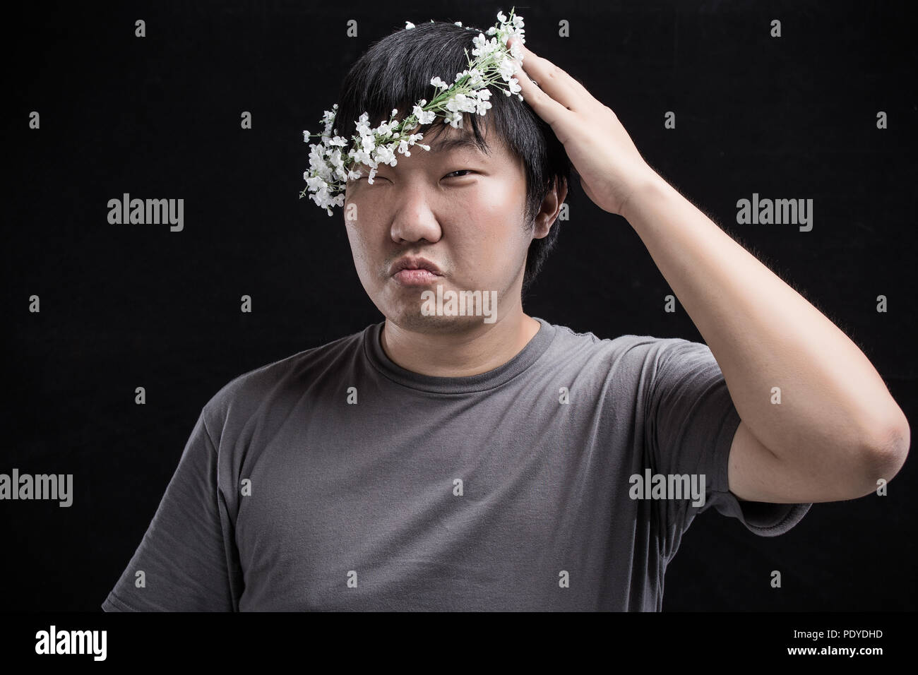 Portrait young man wearing garland hi-res stock photography and images ...
