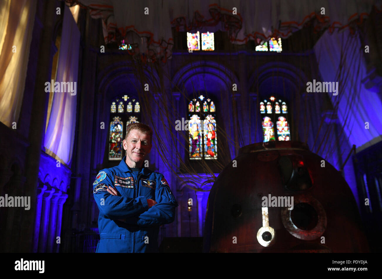 Major Tim Peake with the Soyuz descent module, the spacecraft which ...