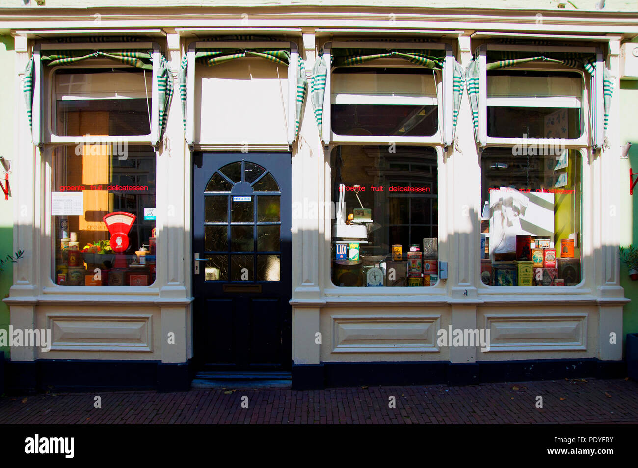 Showcase of an old store in the Netherlands Stock Photo - Alamy