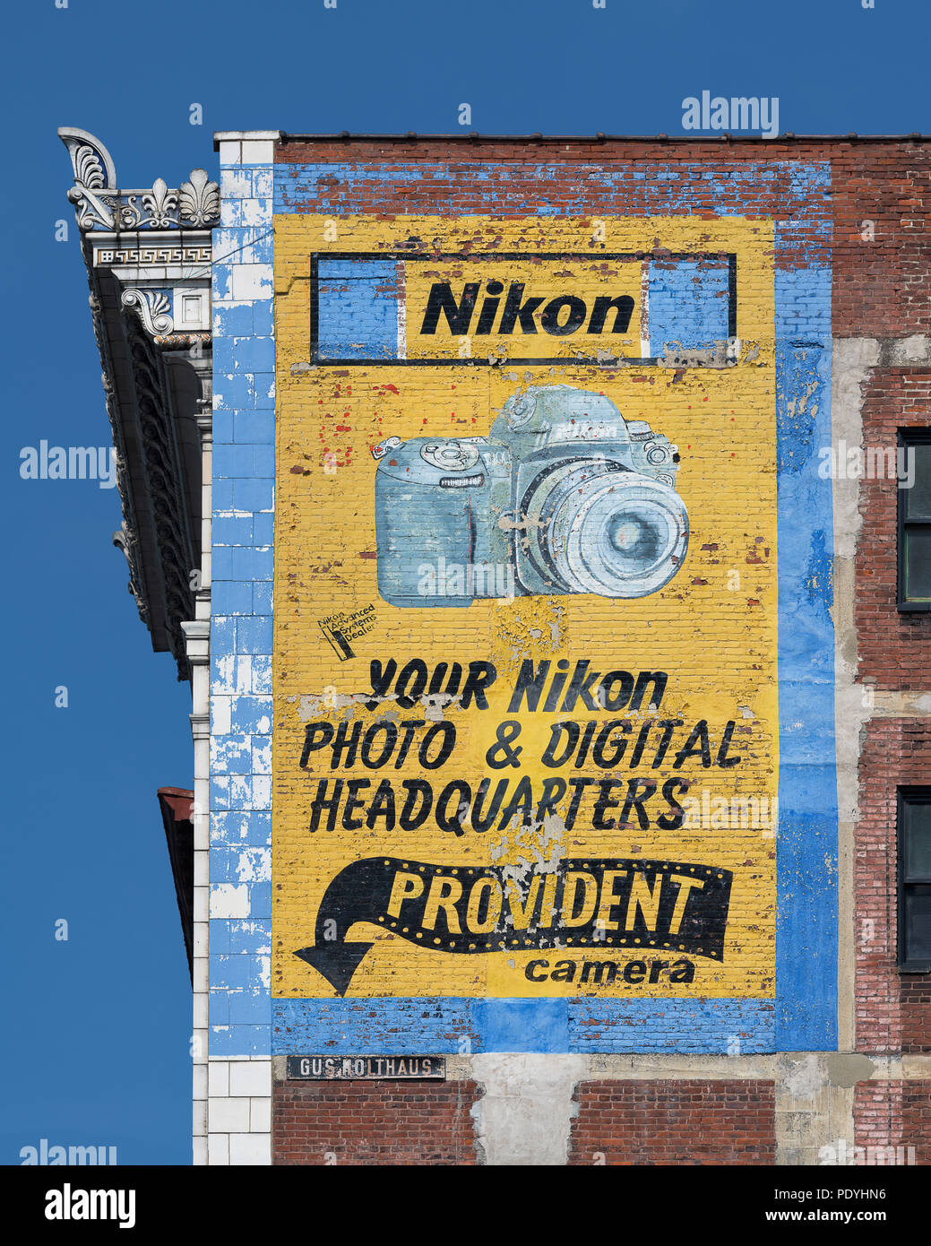Nikon advertisement on red brick wall at 7th & Vine Streets in ...
